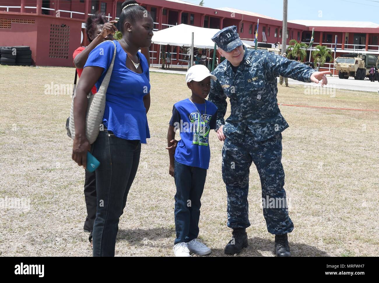 U.S. Navy Reserve Lt. Daniel S. Marciniak speaks with local primary ...