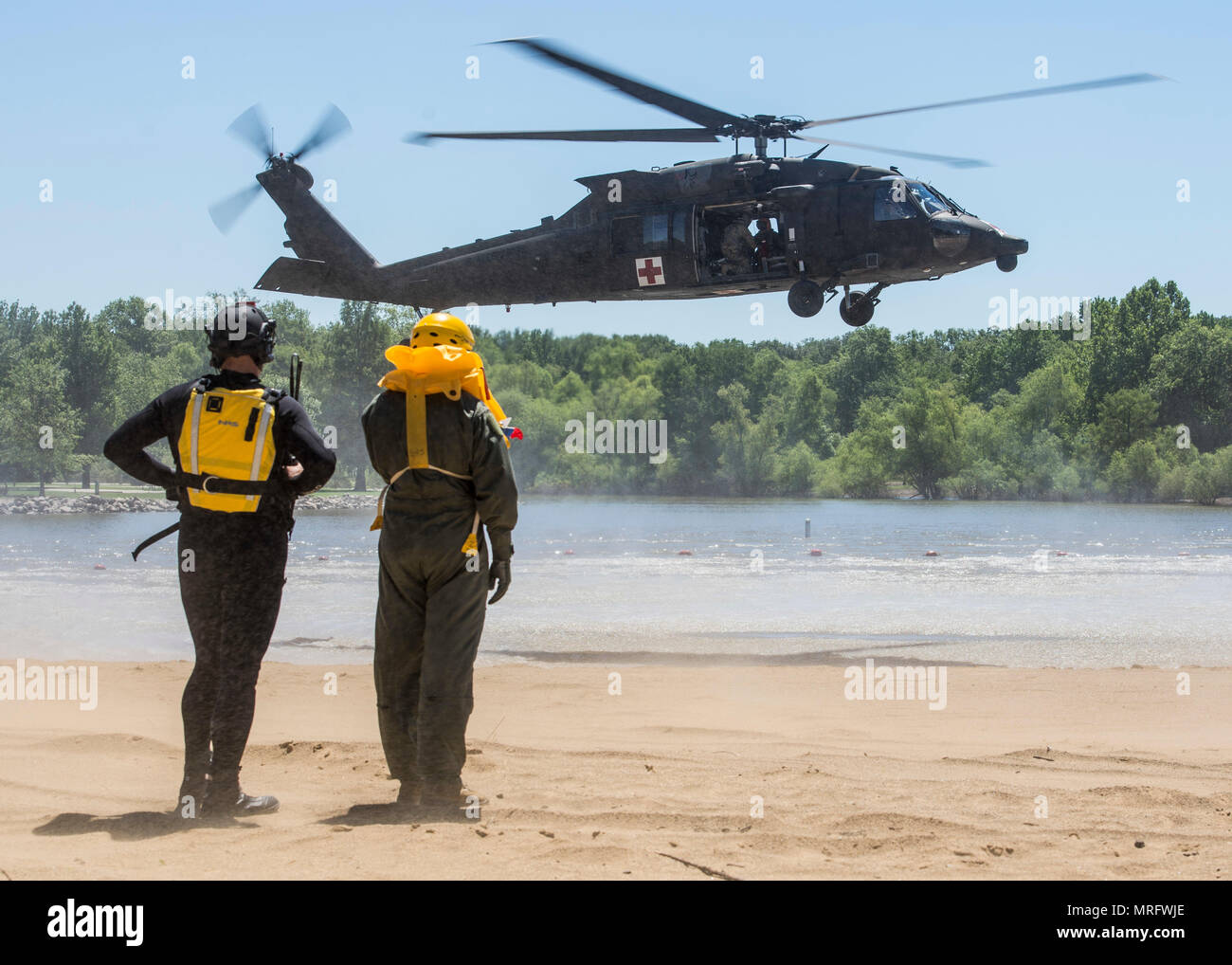 A Survive, Evade, Resist and Escape instructor and Lt. Col. Brandon Dow ...