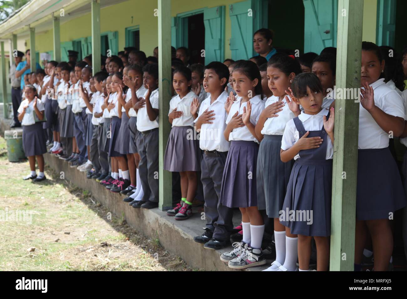 Students of St. Matthews Government School recite the Pledge of Belize ...