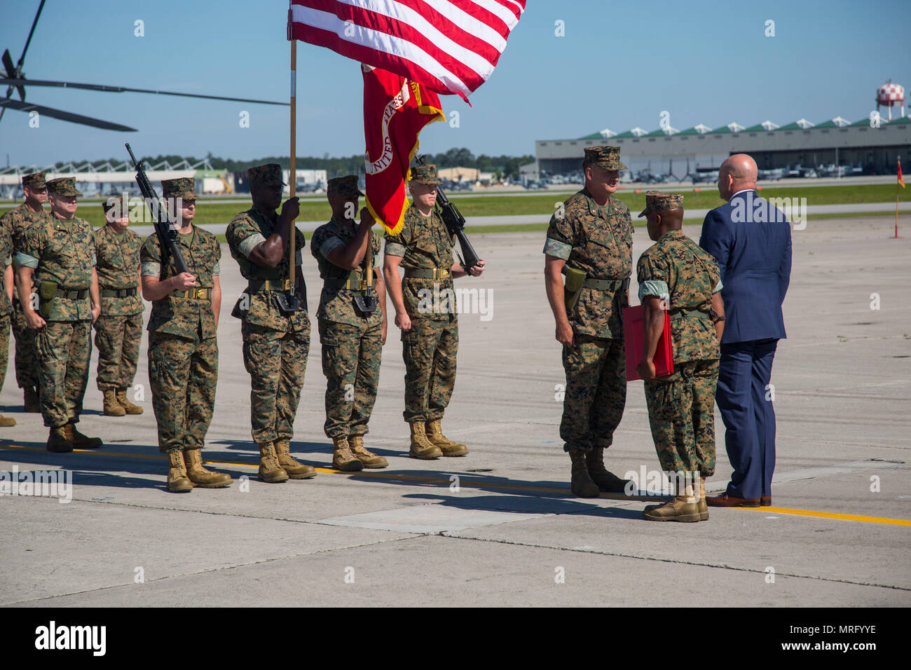 U.S. Marine Corps Lt. Col. Christian M. Ward, center, former commanding ...
