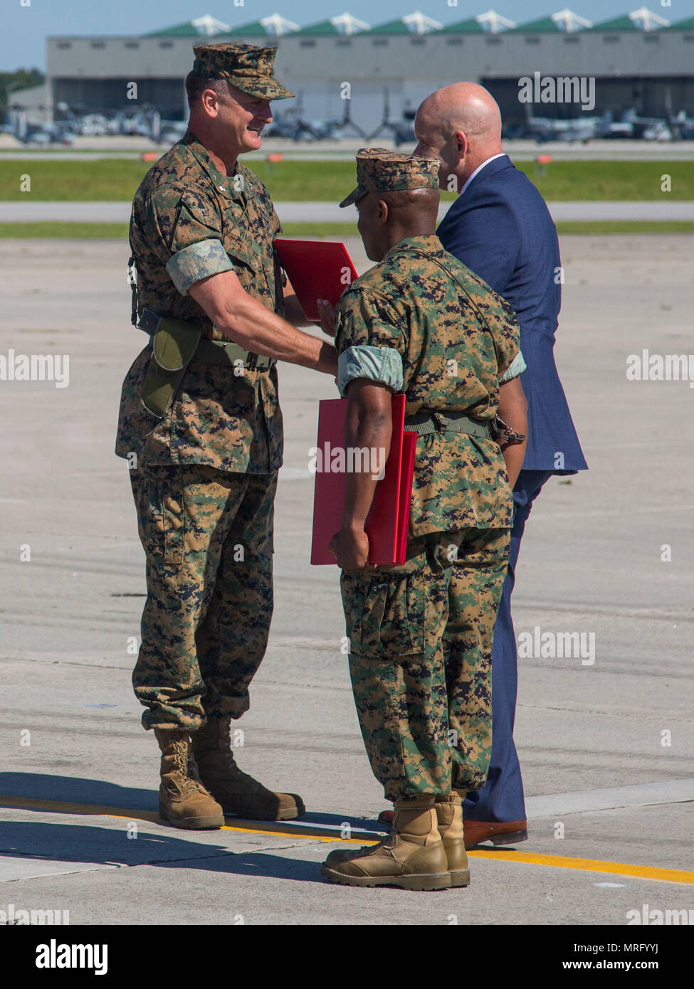 U.S. Marine Corps Lt. Col. Christian M. Ward left, former commanding ...