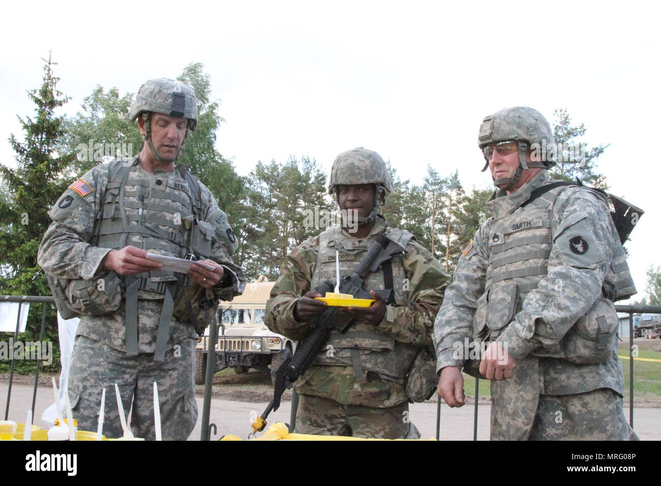 Lt. Col. Jason Benson, SSG Klee Smith and PFC George Ongoro with the 2 ...