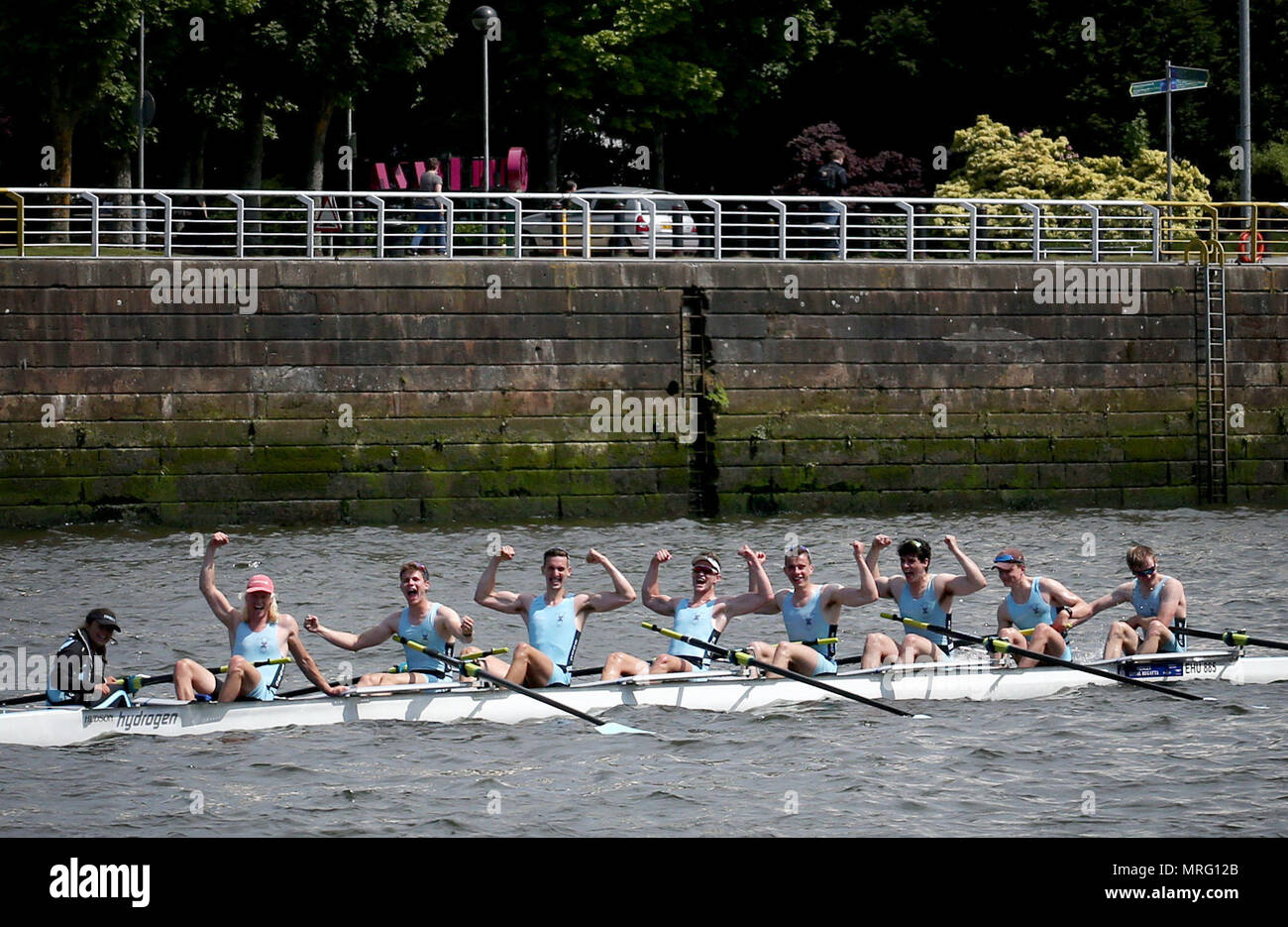 The crew of the men's eight from the University of Edinburgh celebrate ...
