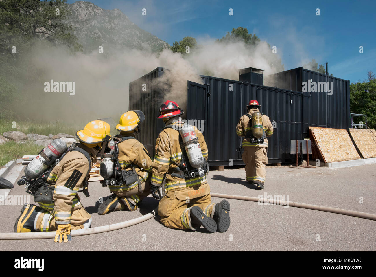CHEYENNE MOUNTAIN AIR FORCE STATION, Colo. – Firefighters from the ...