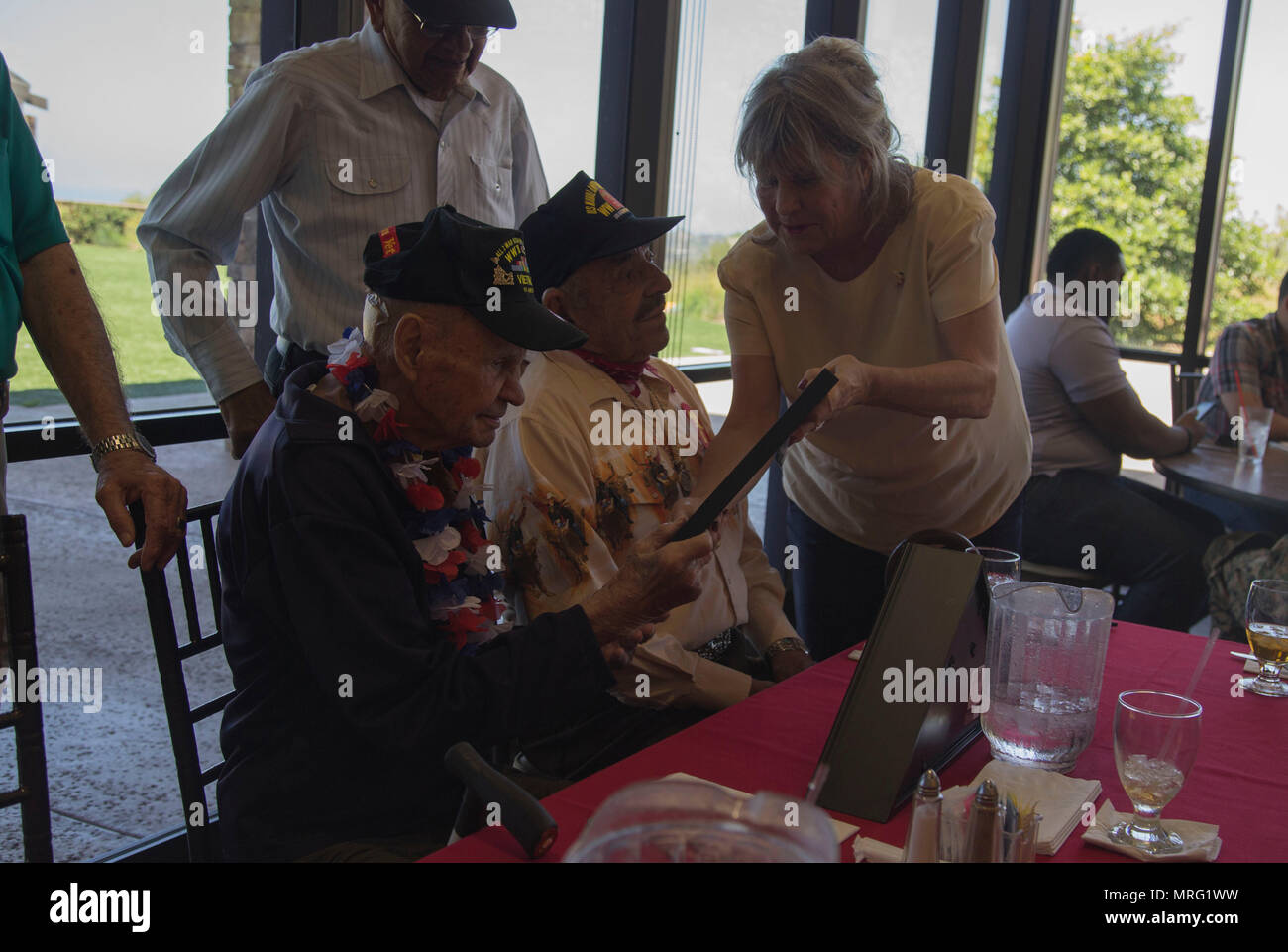 Laura Dietz, right, presents Mike Mervosh, left, with a gift during his ...