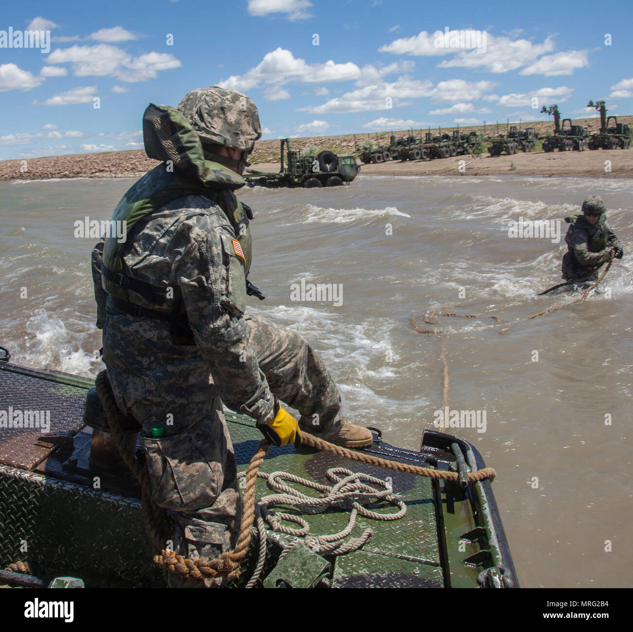 U.S. Army Spc. Benjamin Beyer (left) with the 200th Engineer Company ...