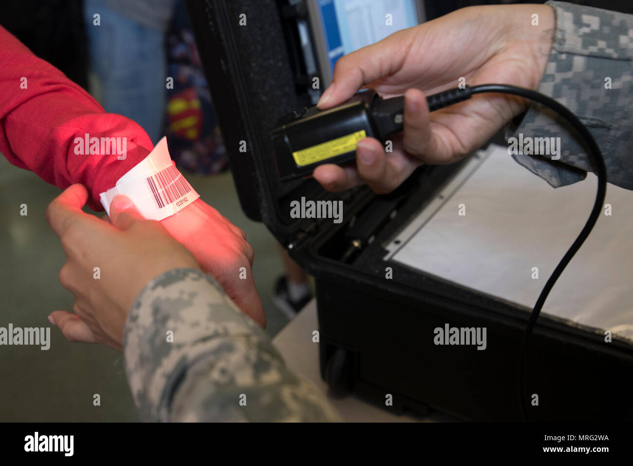 U.S. Army Specialist Brianna Doo, U.S. Army in Japan band, scans a ...