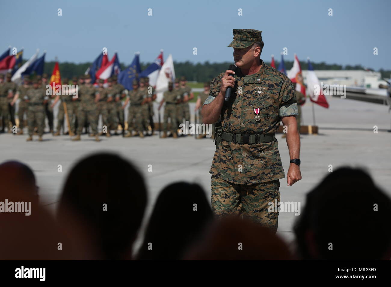 Lt. Col. Christian Ward speaks to friends and family at his retirement ...