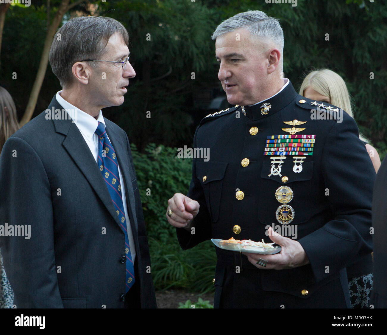 Secretary of the Navy the Honorable Sean J. Stackley, left, speaks to ...