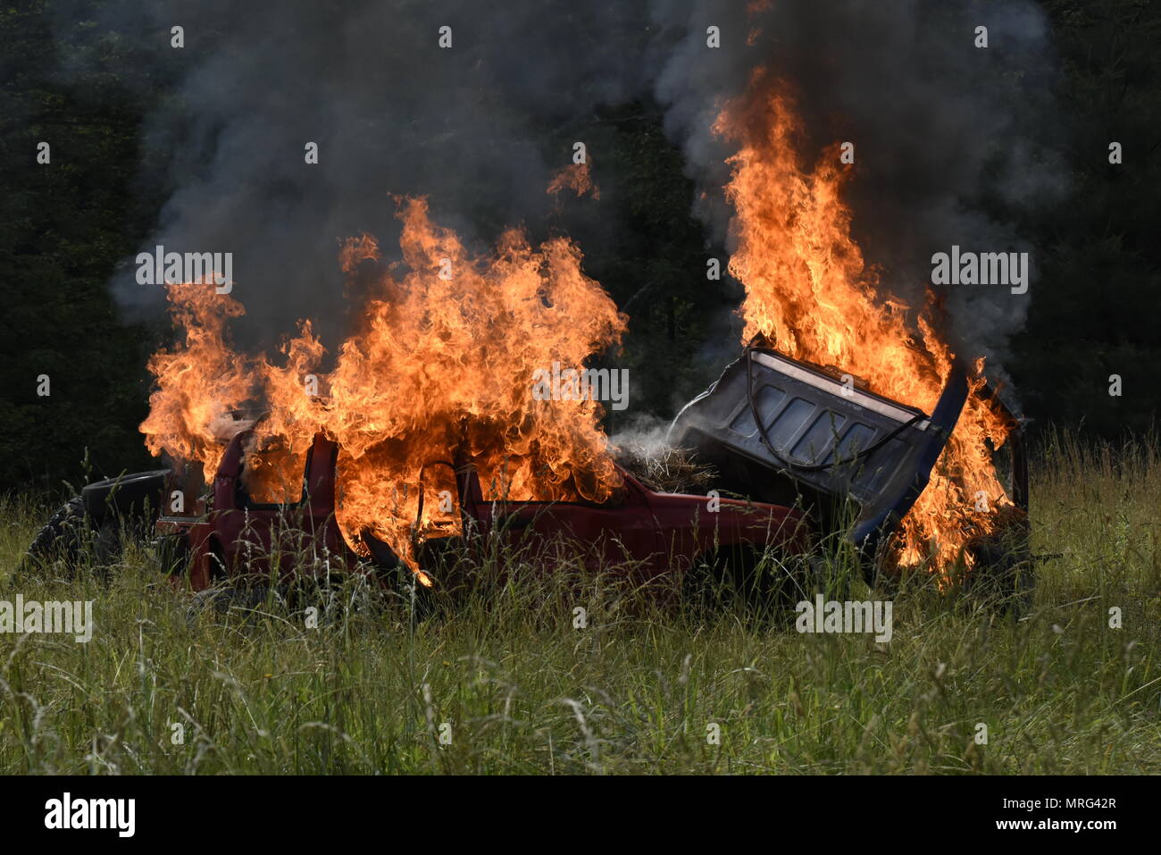 Two dilapidated vehicles are set ablaze to test military emergency ...