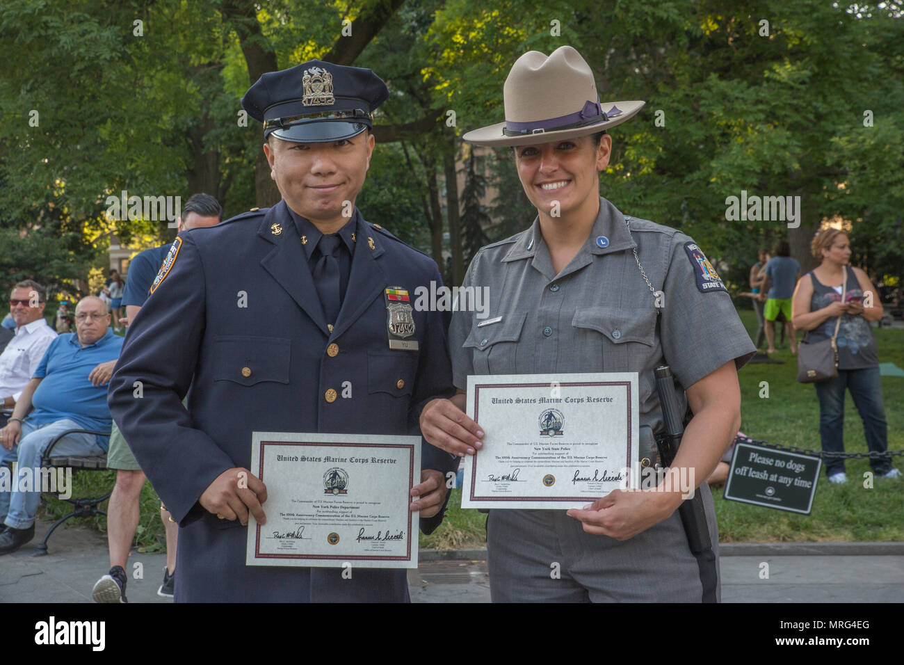 NEW YORK – A representative from the New York Police Department (left ...