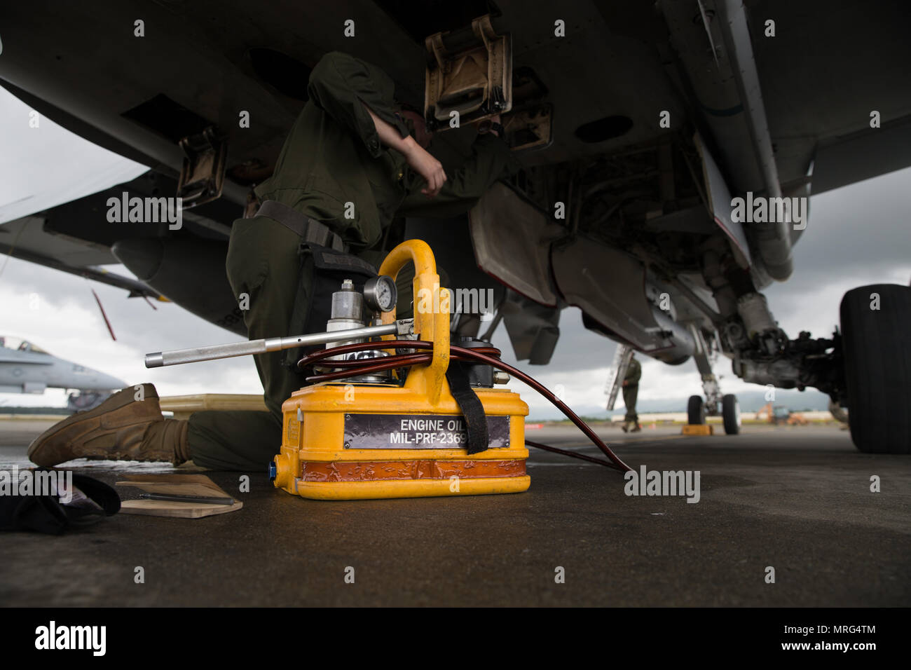U.S. Marine Corps Pfc. Alex D. Kraus, a fixed wing aircraft mechanic ...
