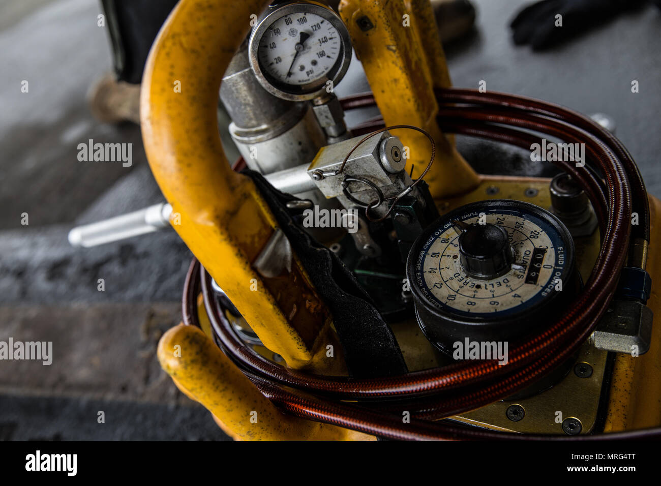 A PON-6 pre-oiler is placed on the flight deck for a pre-flight check ...