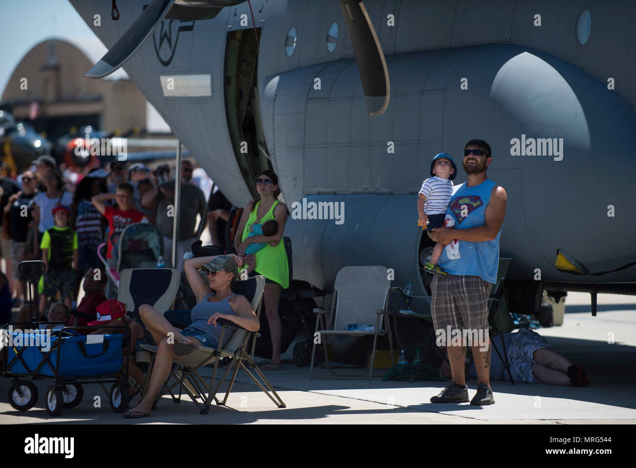 Spectators watch the centennial air show at Scott Air Force Base, Ill ...