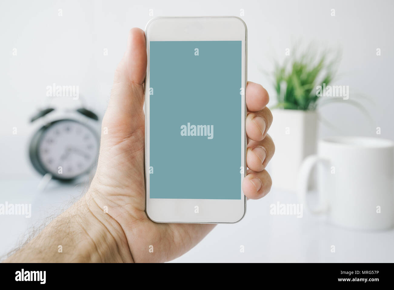 Mobile phone morning routine like checking emails, messages or social ...