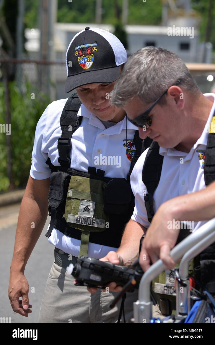 Sgt. Petuel Monje and Sgt. 1st Class Robert Ricks of the 42nd Civil ...