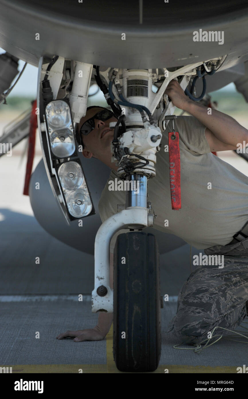Airman First Class Landon Haley, an F-16 Fighting Falcon mechanic ...