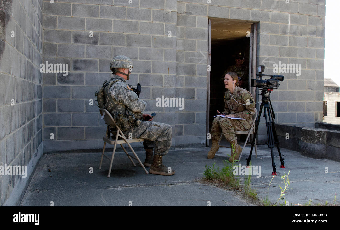 A U.S. Army Reserve Best Warrior candidate conducts a public affairs ...