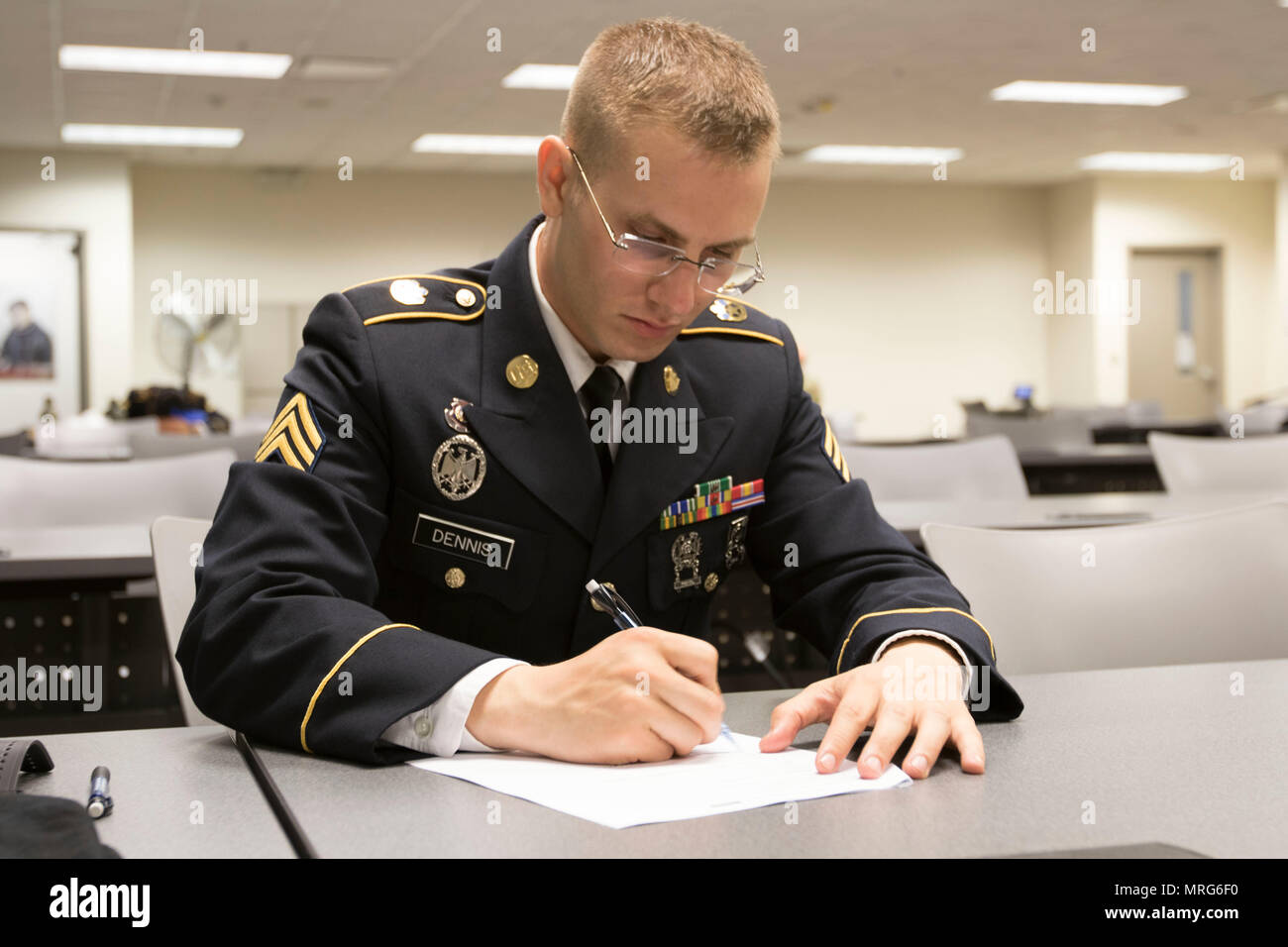 Sgt. Alexander Dennis an administrative specialist representing the ...
