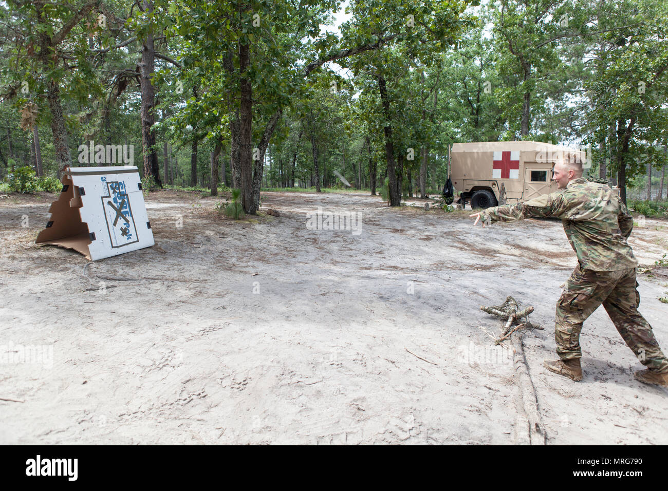 Pfc. Scott Smullen, 325th Military Intelligence Battalion, throws a ...