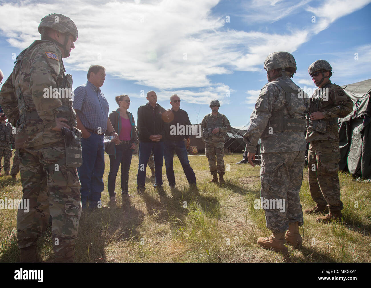 U.S. Army Maj. Gen. Timothy Reisch (left) The Adjutant General, South ...