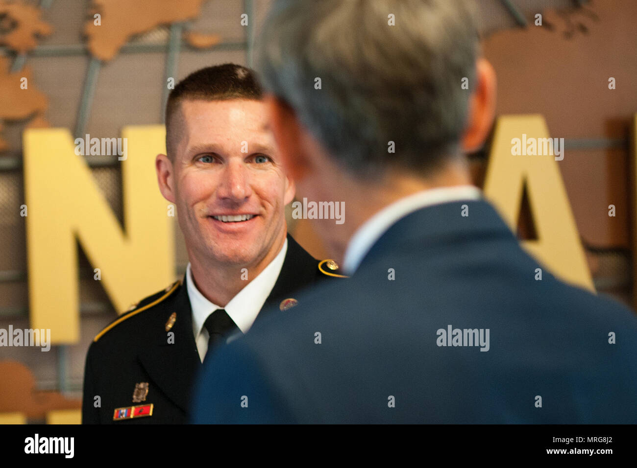 U.S. Army Command Sgt. Major Daniel A. Dailey speaks with Acting-Army Secretary, Honorable ...