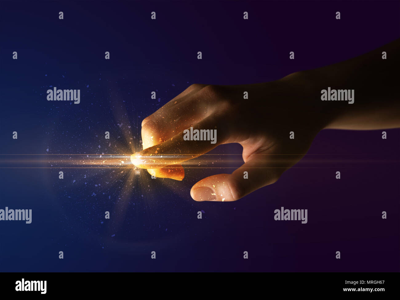 Female finger touching a beam of light Stock Photo - Alamy