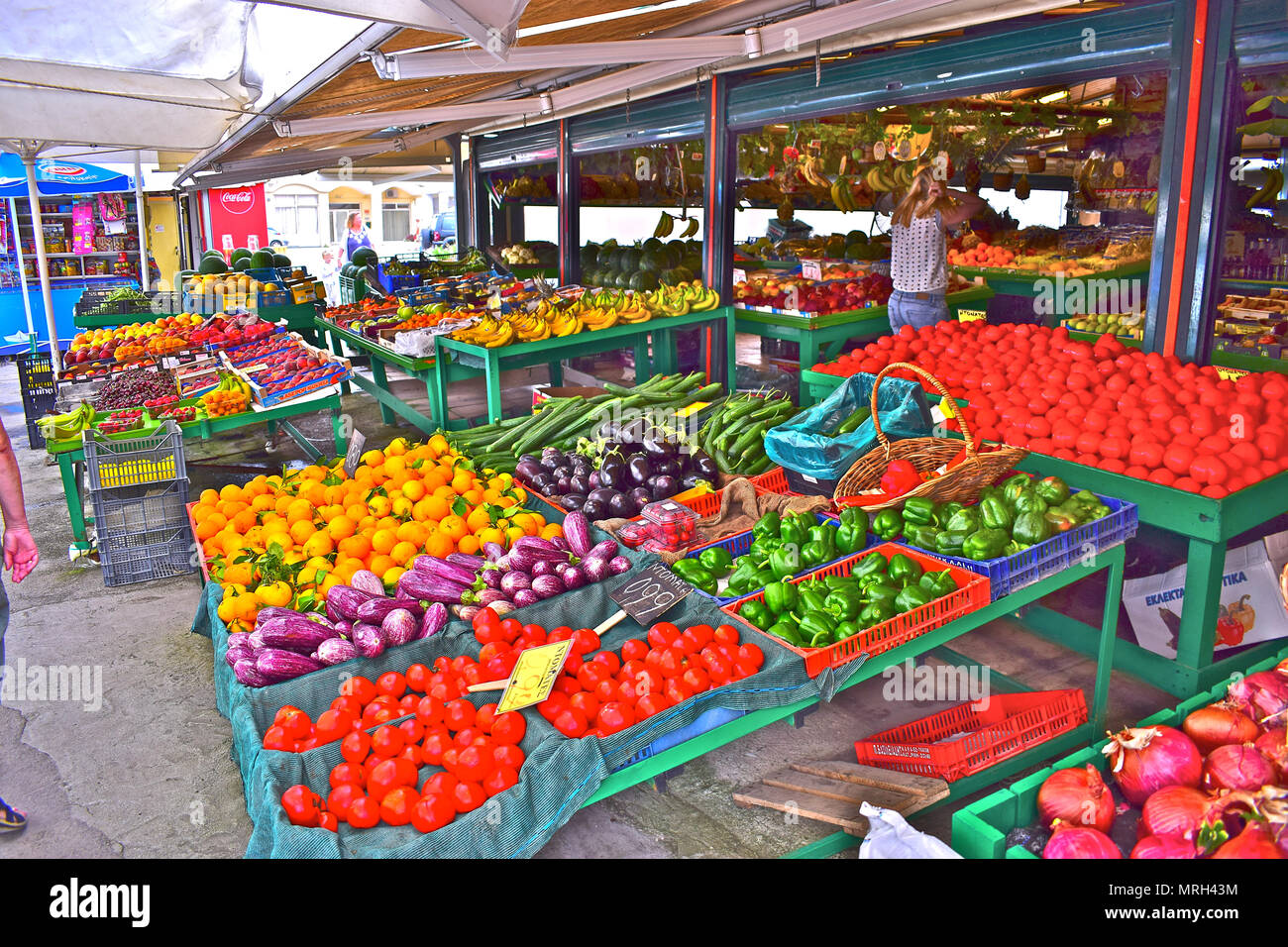 A colourful display of fresh fruit and vegetables in a market stall on ...