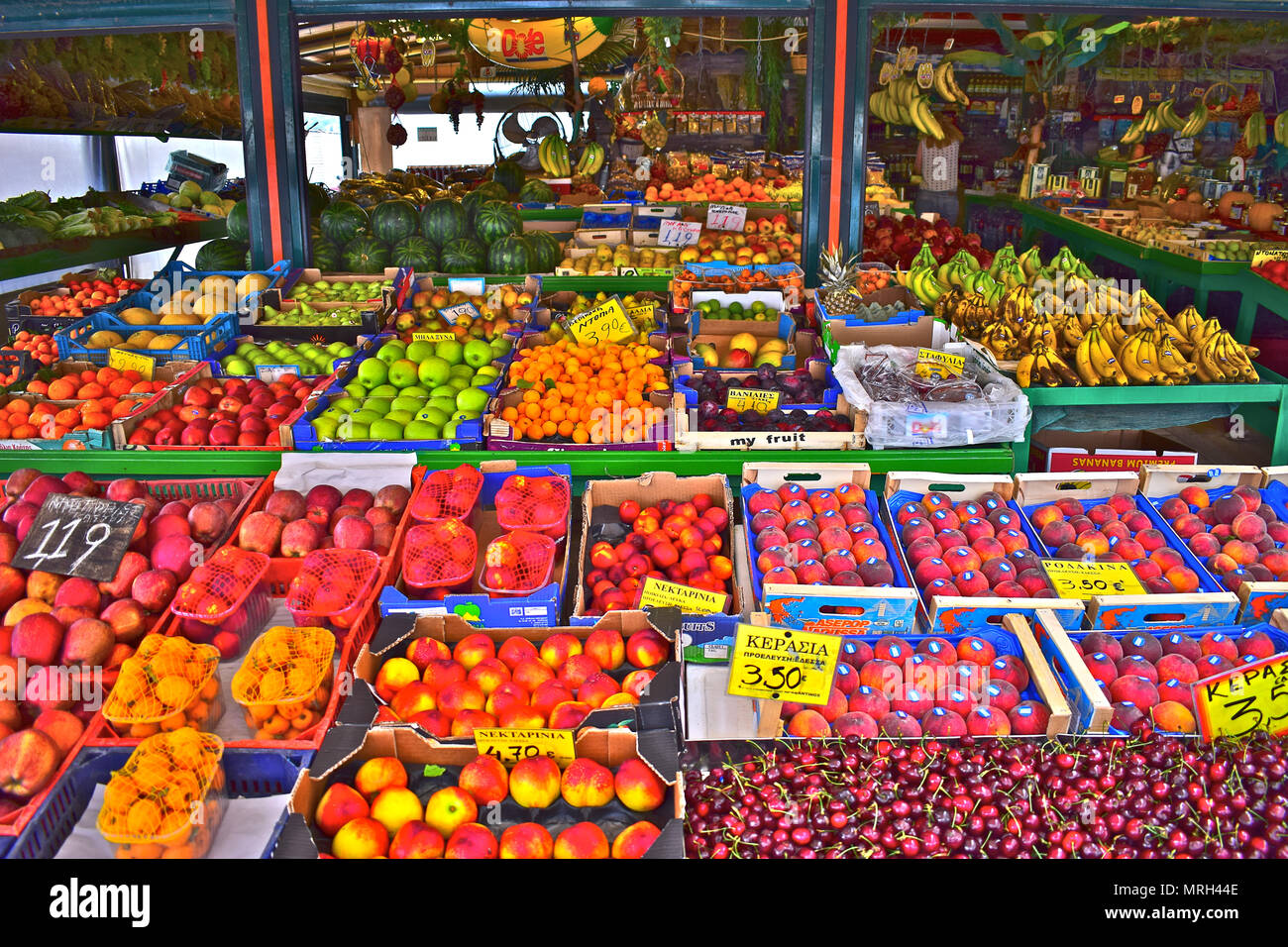 A colourful display of fresh fruit and vegetables in a market stall on ...