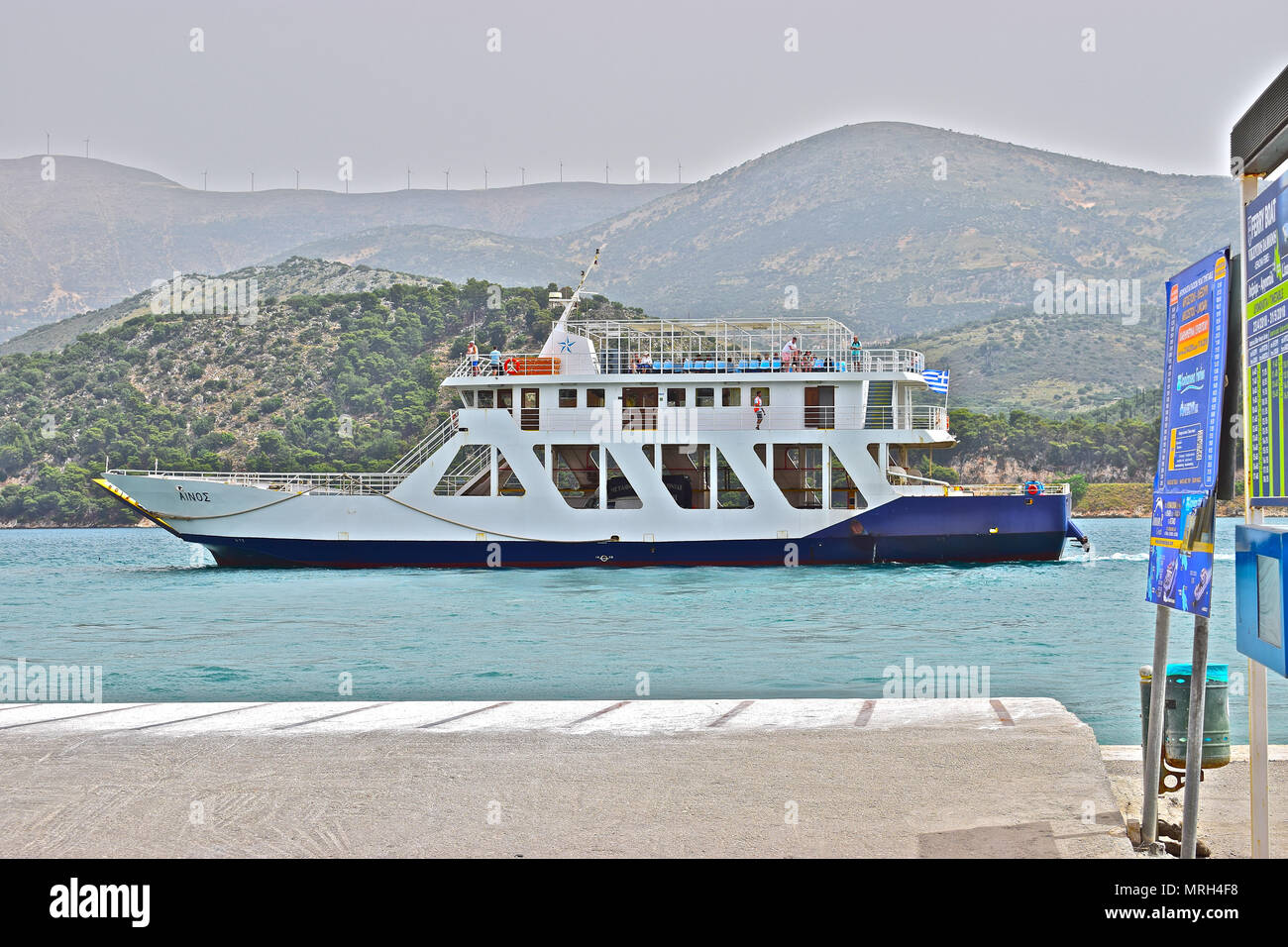 The vehicle & passenger ferry sets of from Argostoli harbour heading ...