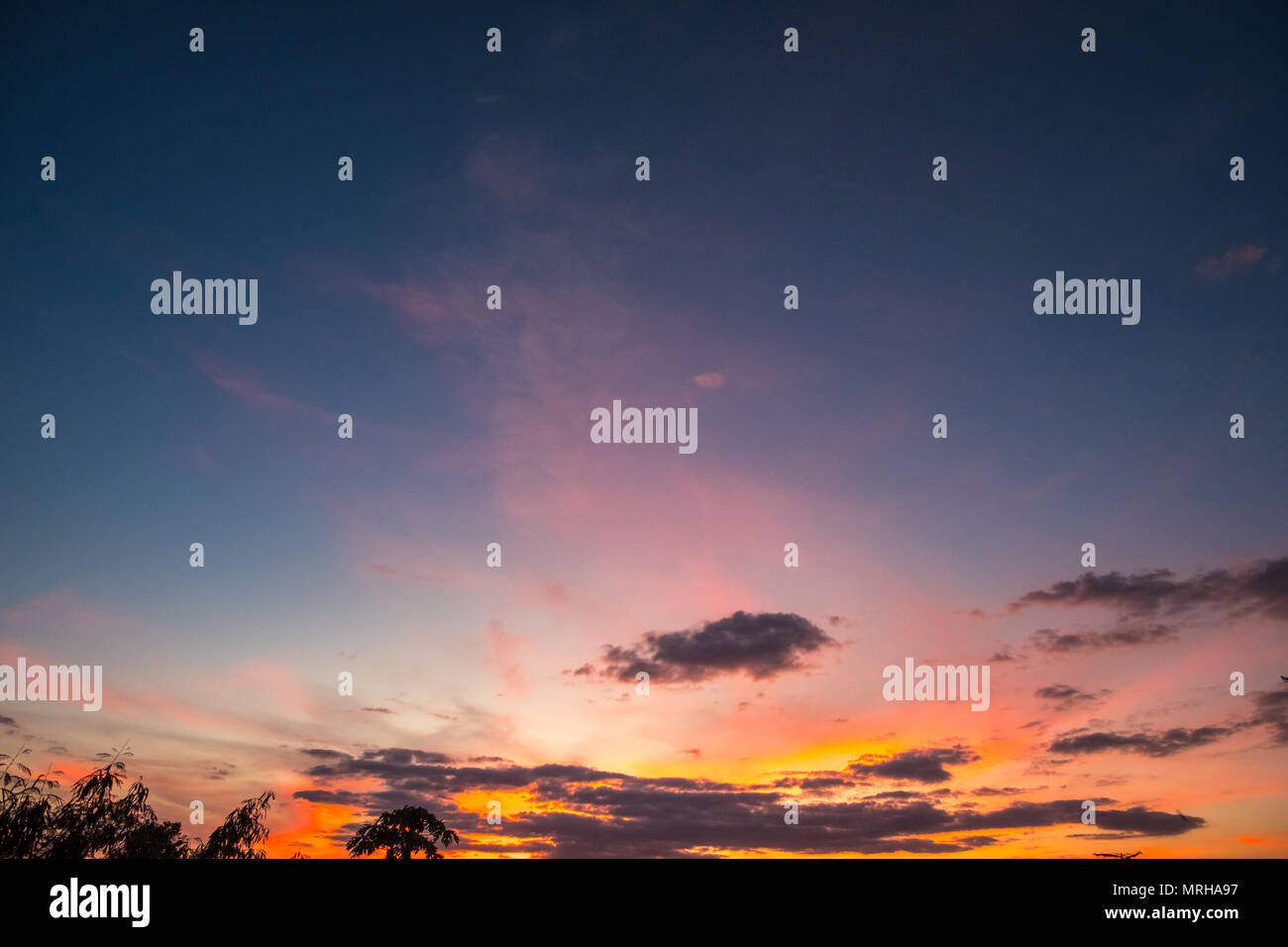 Colorful dramatic sunset sky Stock Photo - Alamy