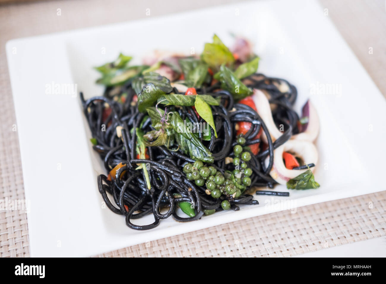 Cooking black spaghetti seafood hi-res stock photography and images - Alamy