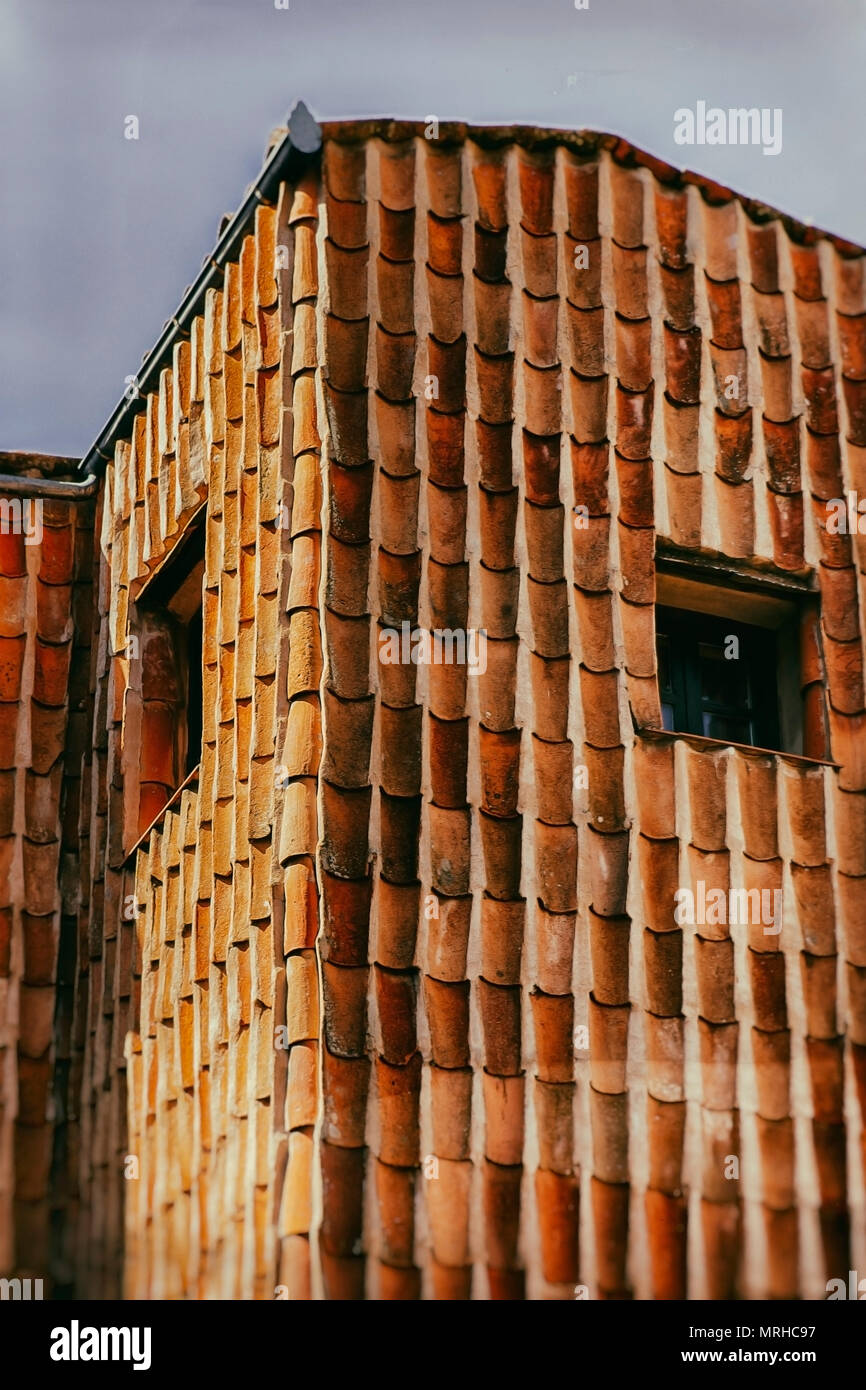 facade of red tiles, hervas-caceres Stock Photo - Alamy