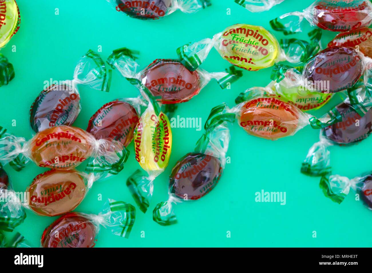 Campino boiled fruit flavoured sweets on a turquoise background Stock ...