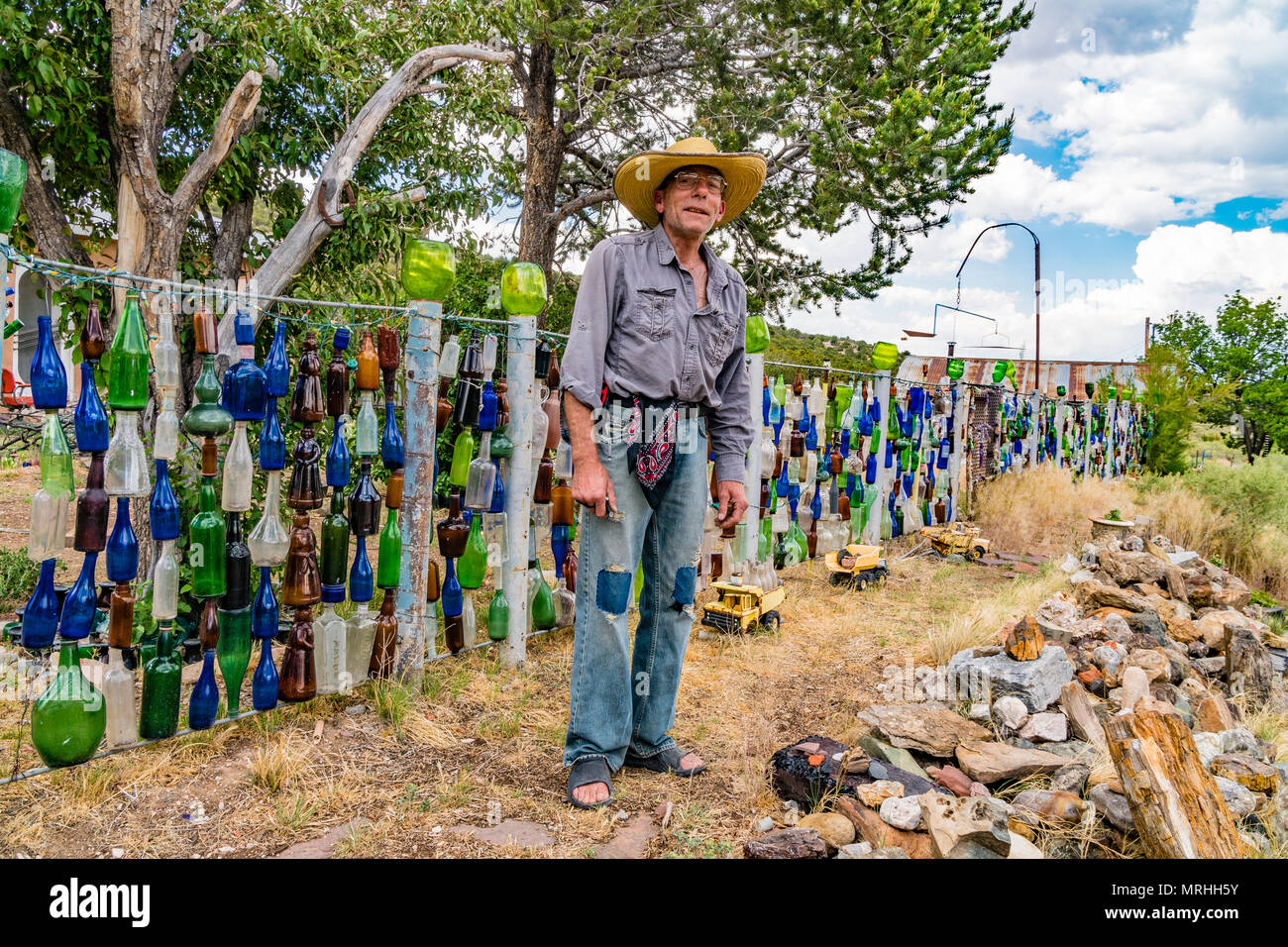 Tom Larson, the eccentric owner of the bottle house in Golden, New ...