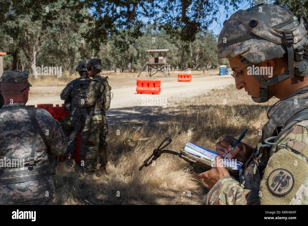 U.S. Army 2nd lt. Alberto Martinez draws a plan to fix weak spots in ...