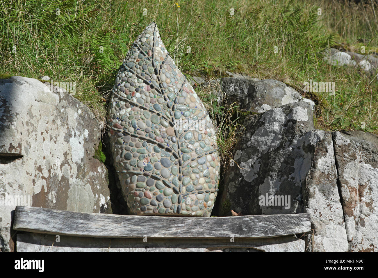 Leaf sculpture in stone Stock Photo - Alamy