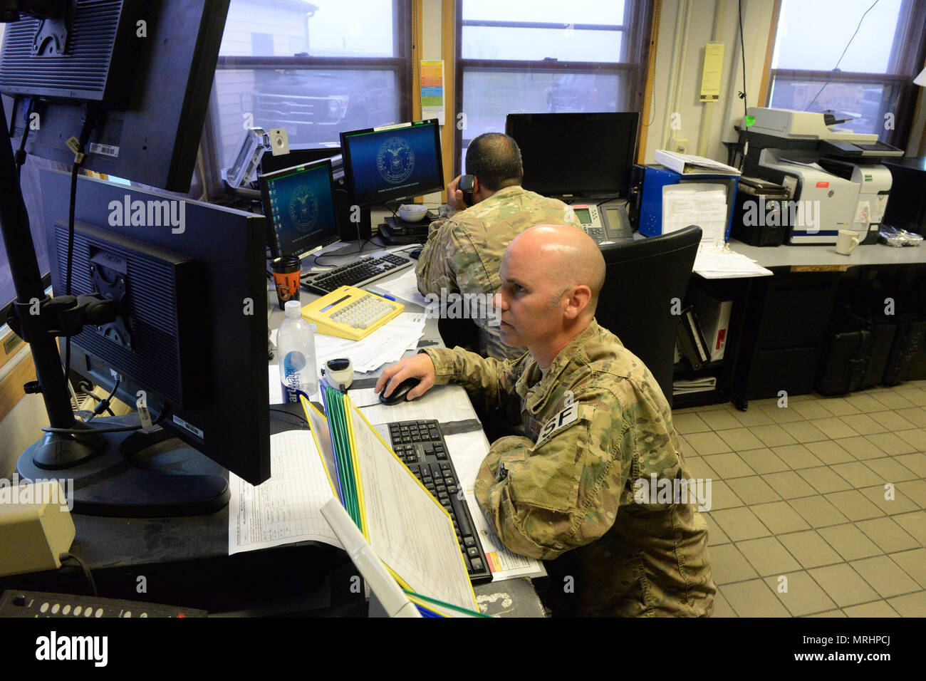 U.S. Air Force Master Sgt. Paul Skees, front, and Tech. Sgt. John ...