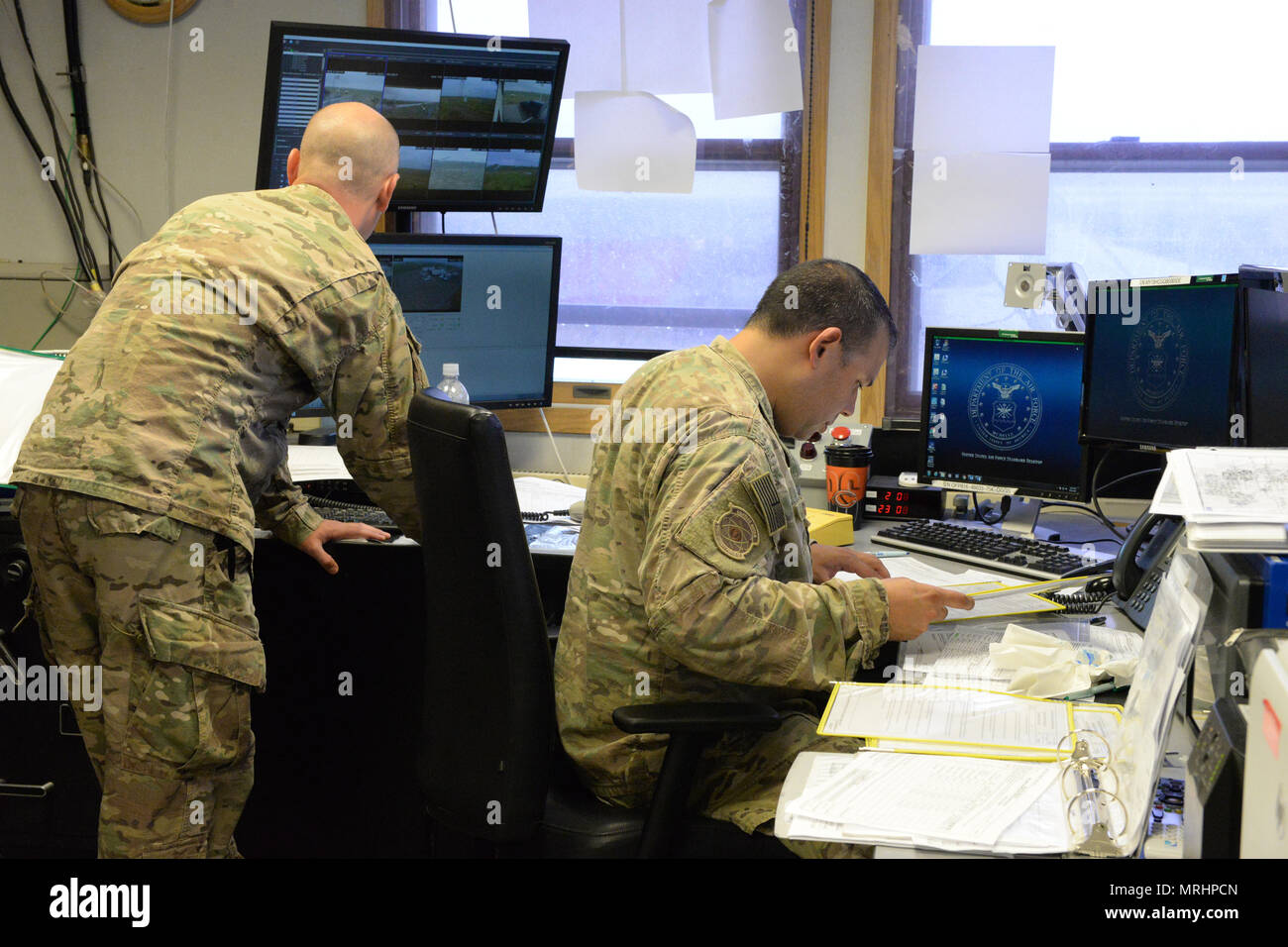 U.S. Air Force Master Sgt. Paul Skees, left, and Tech. Sgt. John ...