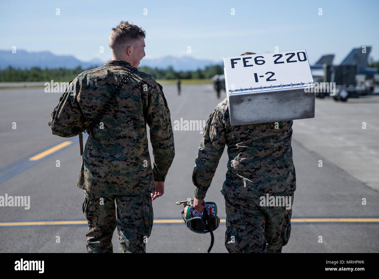 U.S. Marine Corps Lance Cpl. Rhyder L. Day, left, and Pfc. Matthew J ...
