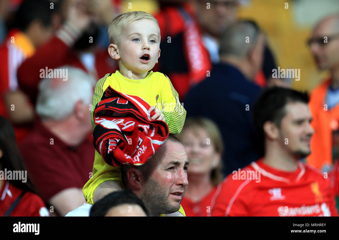 A young Liverpool fan shows his support in the stands prior to the UEFA ...