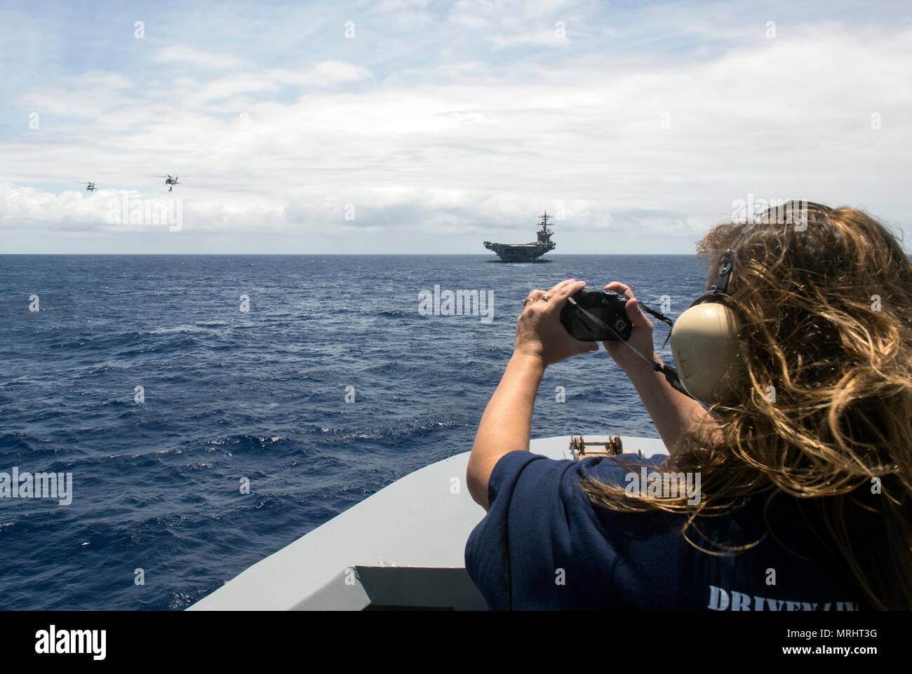 170618-N-FT178-429 PACIFIC OCEAN (June 18, 2017) A family member of a ...