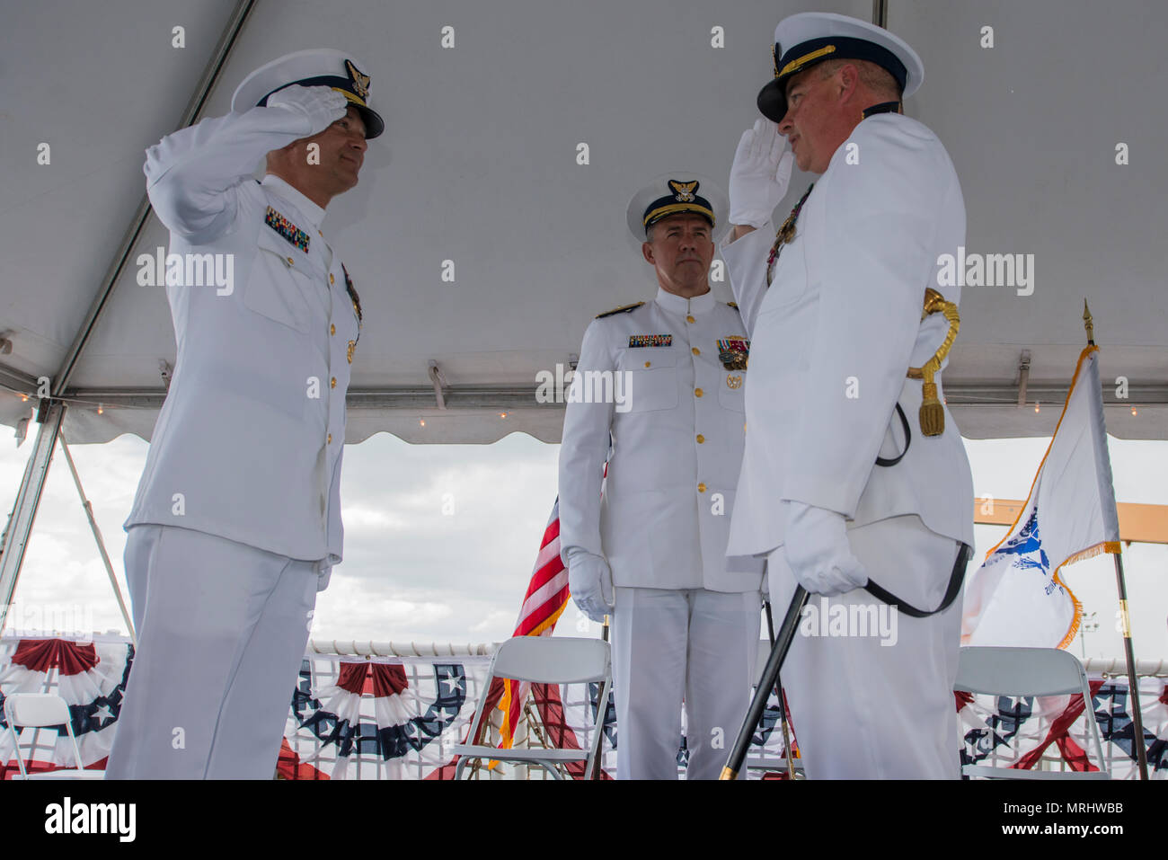 Capt. Scott Clendenin, right, transfers command of the Coast Guard ...