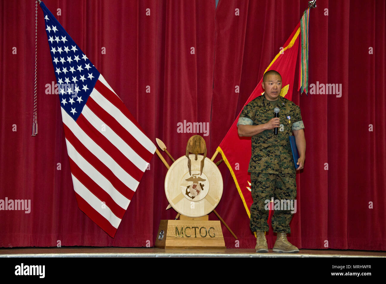 U.S. Marine Corps Capt. Andrew Kim, intelligence officer, speaks during ...