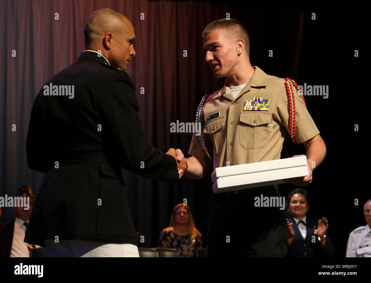 Maj. Jared Reddinger (Left), recognizes Danny Viboch for receiving the ...