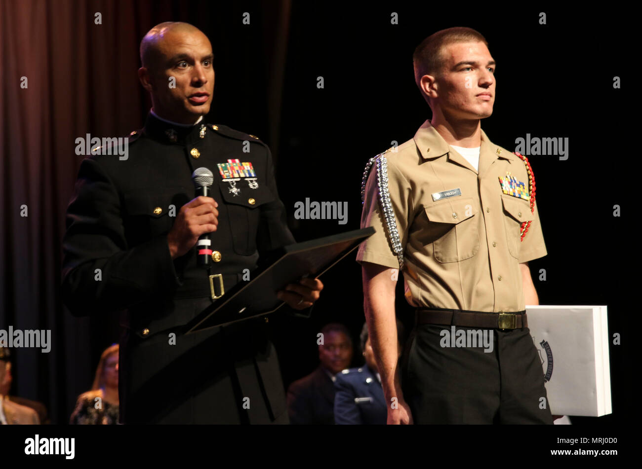 Maj. Jared Reddinger (Left) delivers a speech to Westview High School's ...