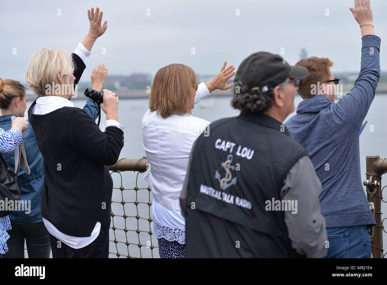170617-N-ZU404-082 BOSTON (June 17, 2017) Visitors wave to passing ...