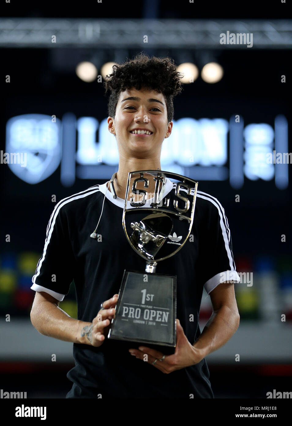 Jenn Soto celebrates with the trophy after the Women's Final during day ...
