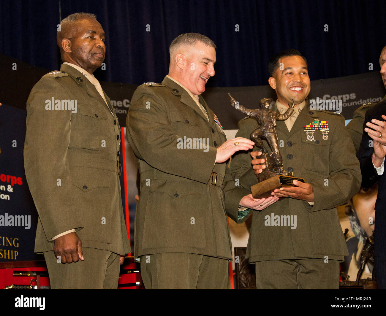 U.S. Marine Corps Gen. Glenn M. Walters, left, 34th assistant ...