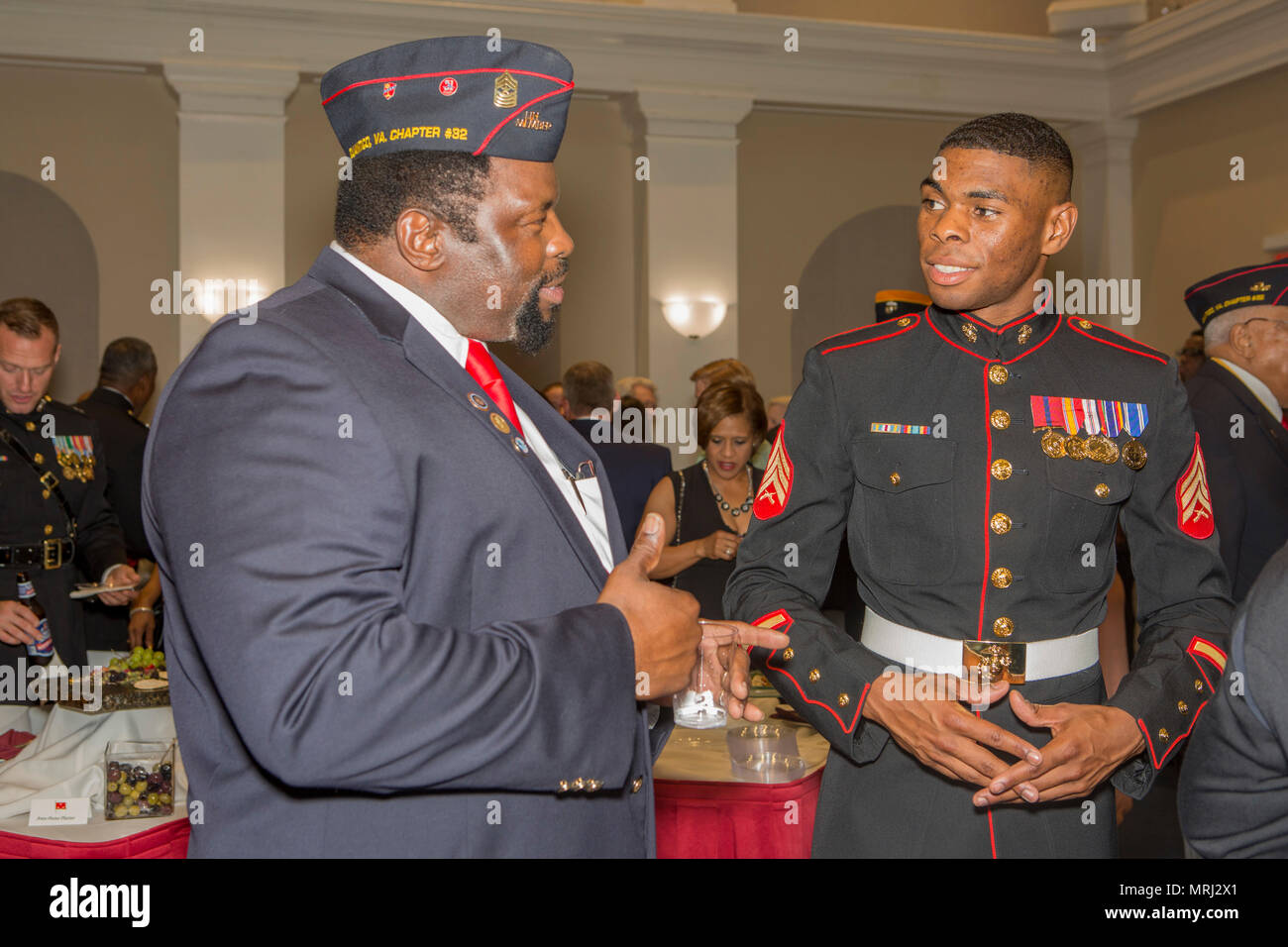 A member of the National Montford Point Marine Association speaks with ...